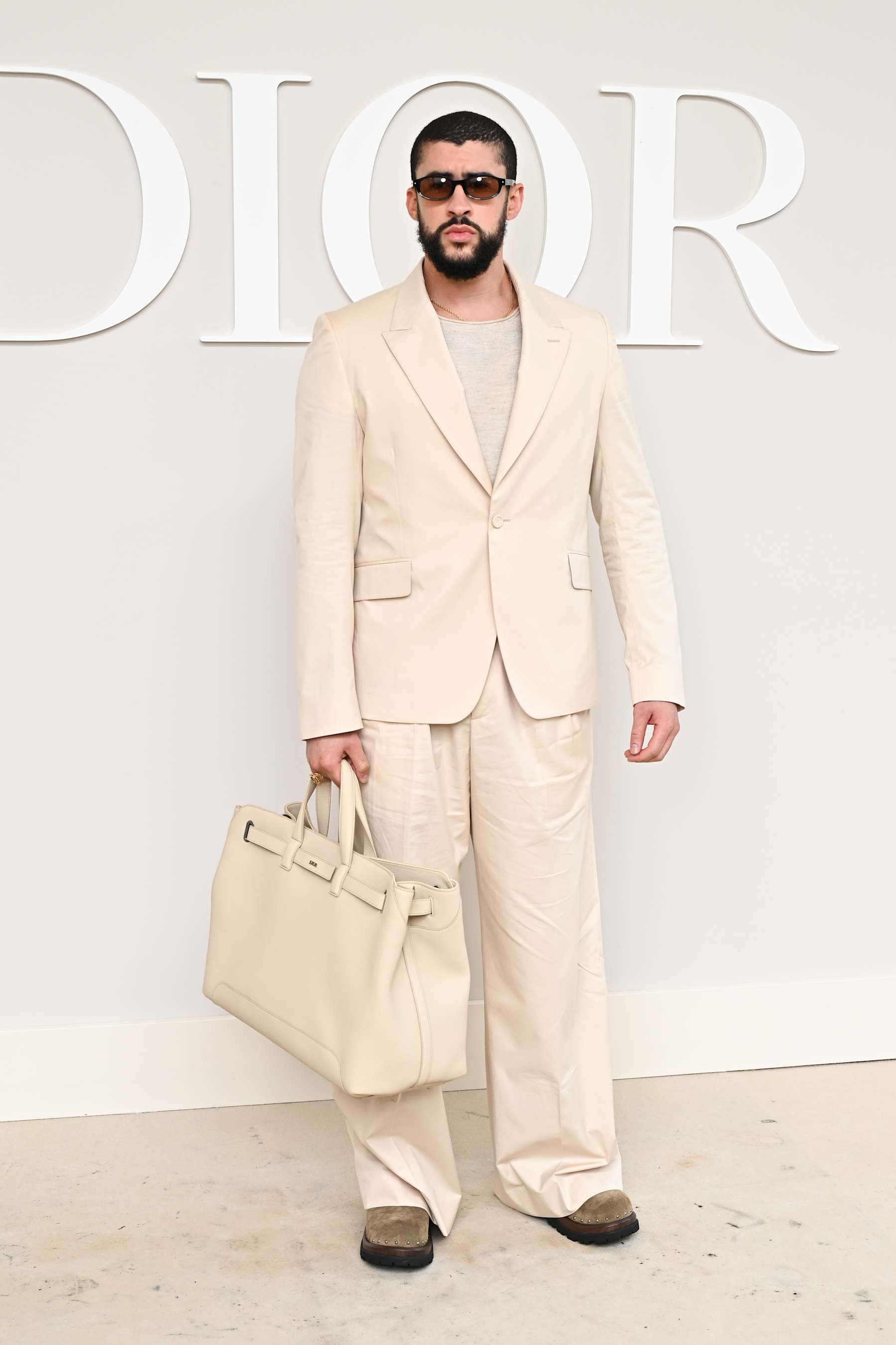 Triple H Teases Bad Bunny's Return; Rumors on Roman Reigns' Merch Sales ...