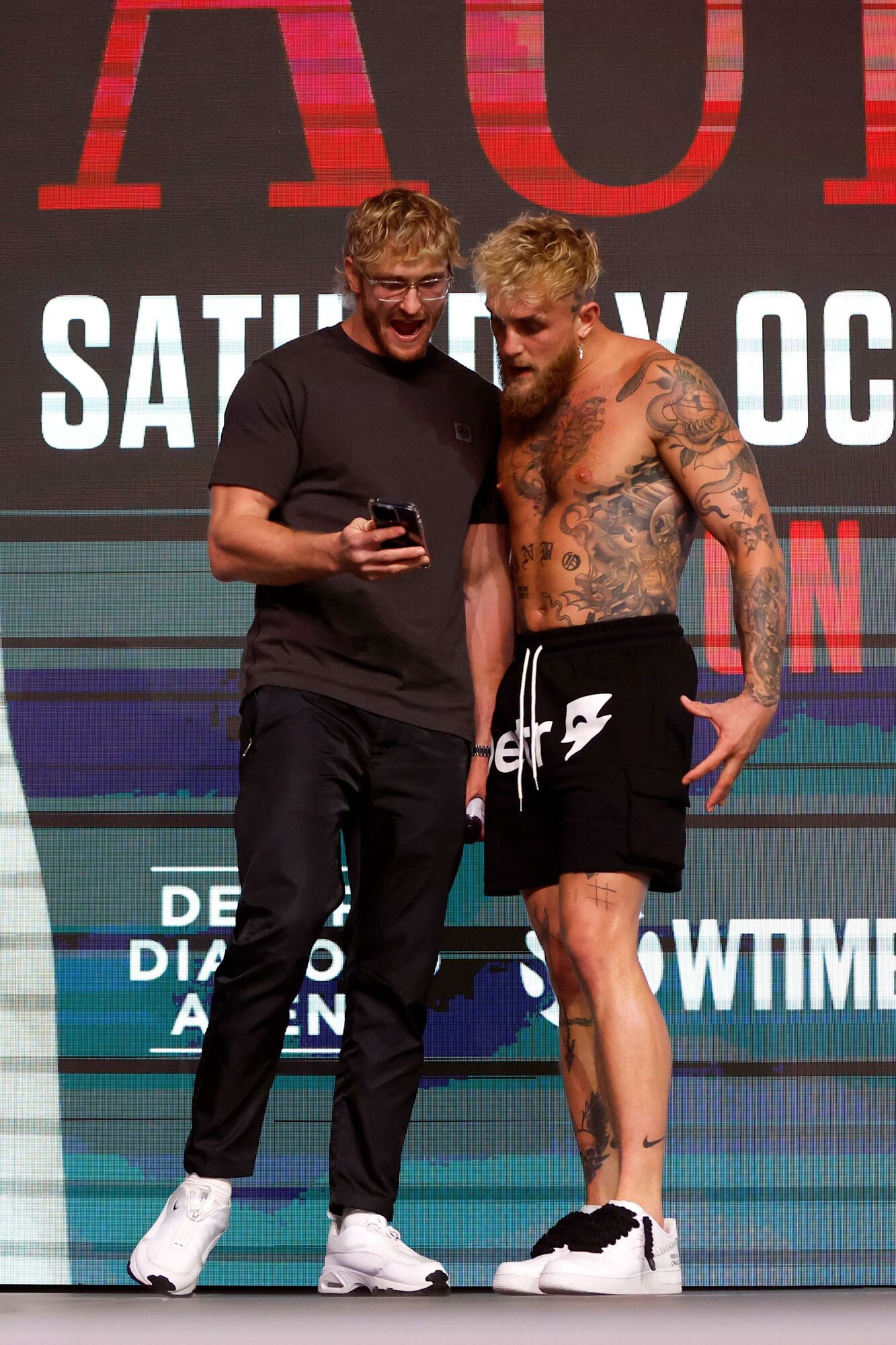 WWE's Logan Paul Reacts to 'F--king Iconic' Mike Tyson-Jake Paul Slap ...