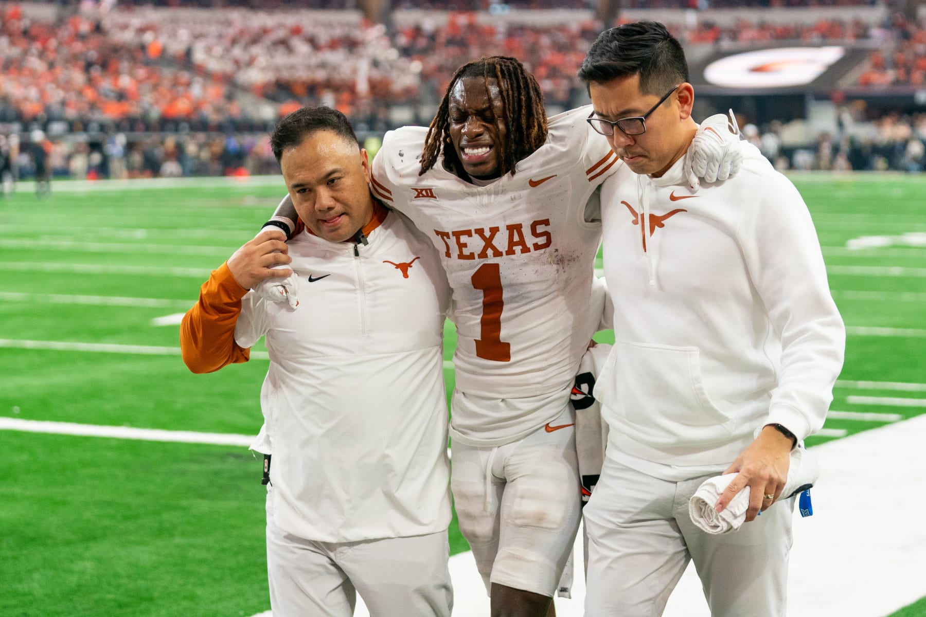 Texas' Xavier Worthy on Crutches After Suffering Leg Injury vs ...