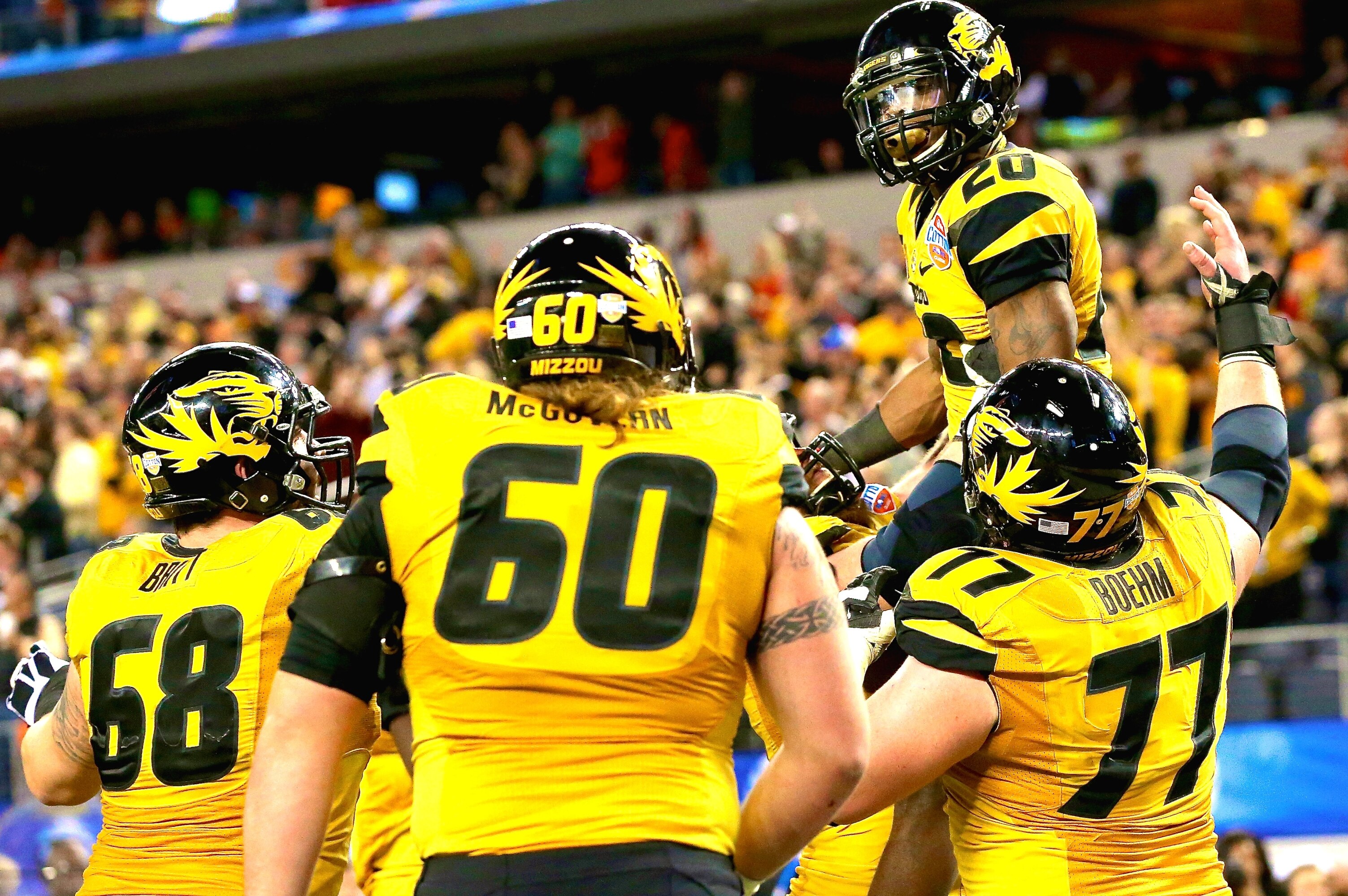 What Early College Football Win Totals Tell Us About 2014 Season