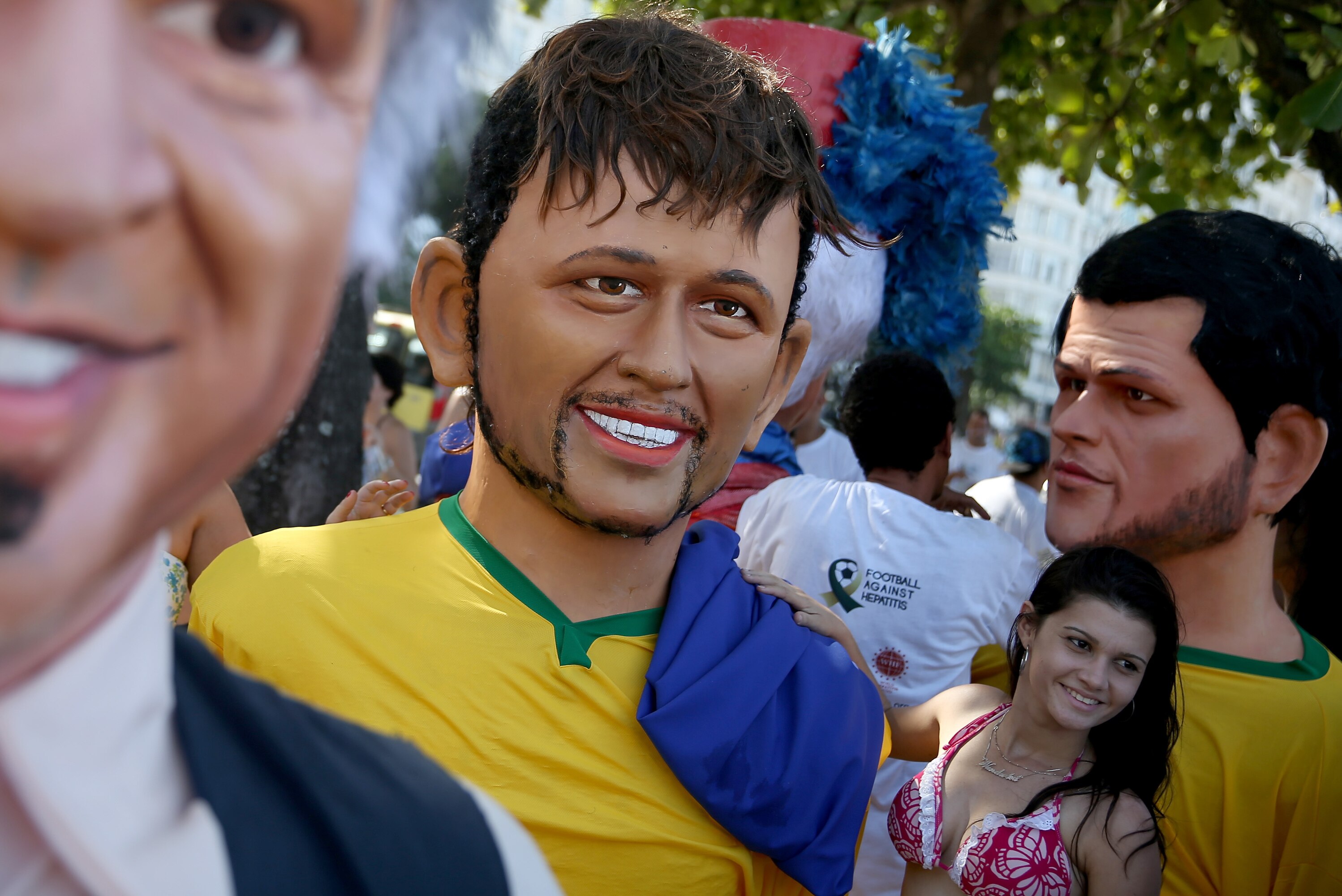 Creepy Large Puppets of Neymar, Cristiano Ronaldo and More Flood Rio Parade