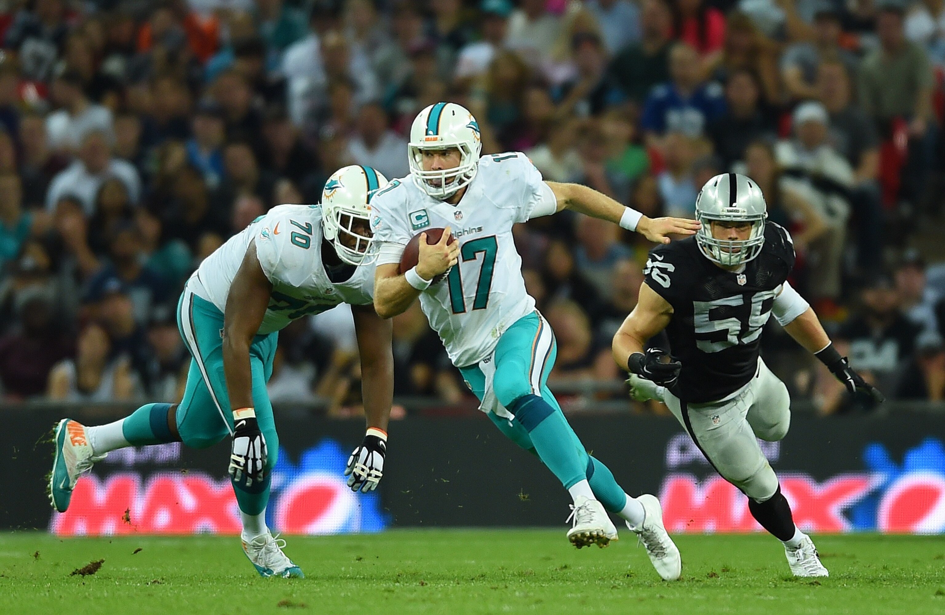Miami Dolphins Show Team Unity in Victory over Raiders