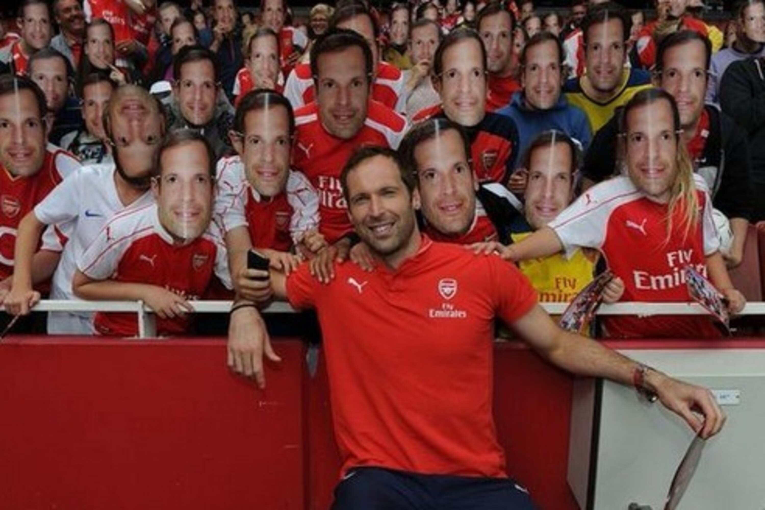 Petr Cech Poses with Arsenal Fans Wearing Petr Cech Masks