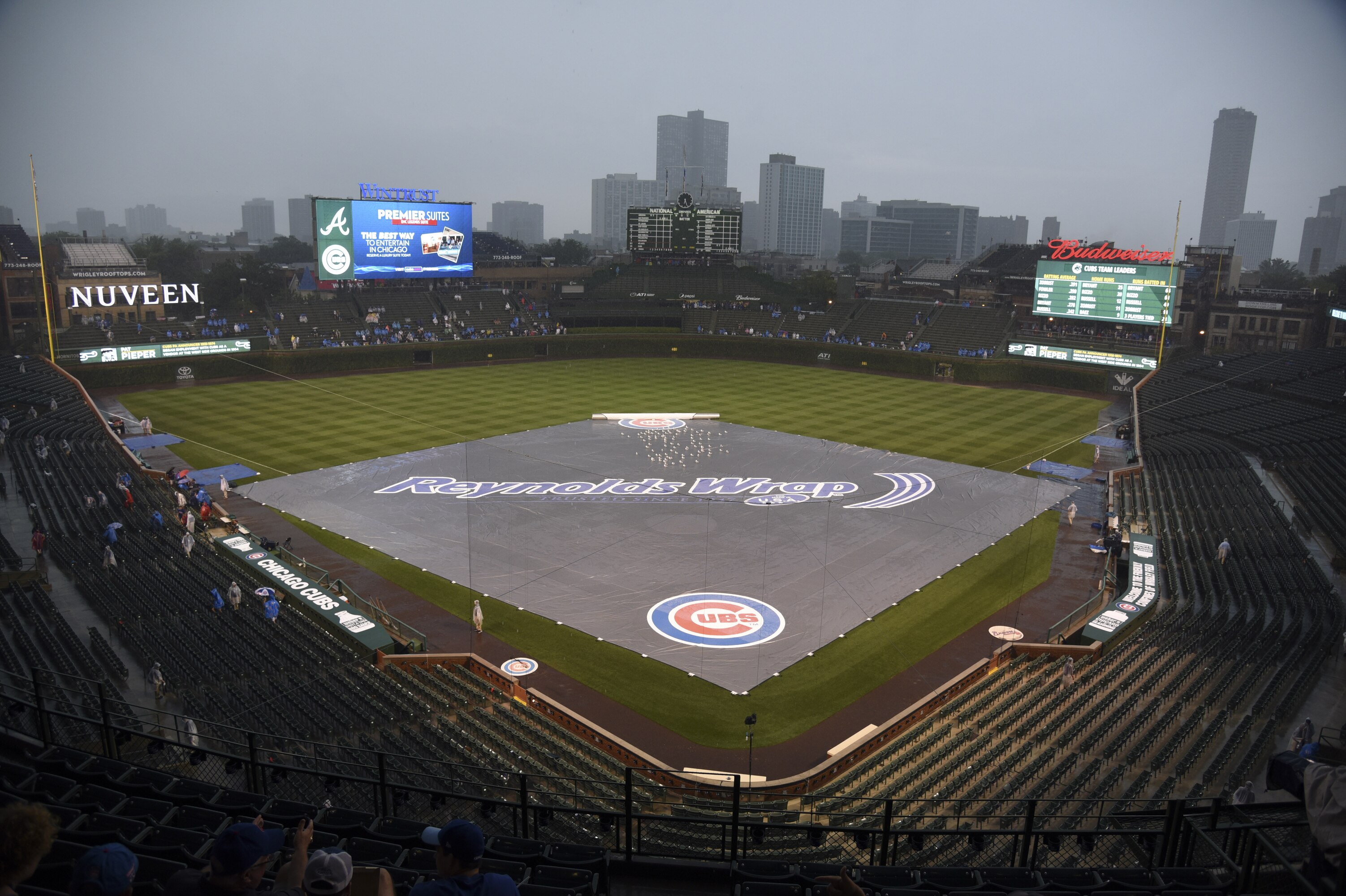Fan Falls from Bleachers onto Field During Braves vs. Cubs Delay